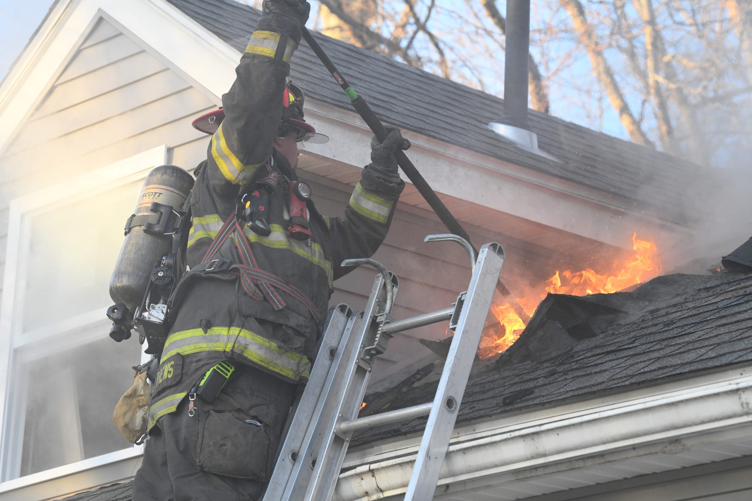 Firefighters quell blaze in living area above Orange garage ...